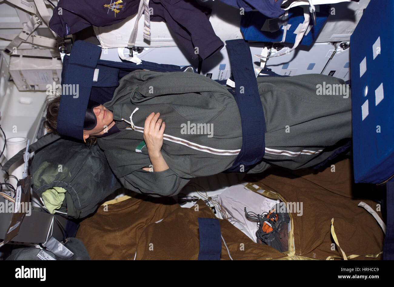 Astronaut sleeping space station hi-res stock photography and images ...