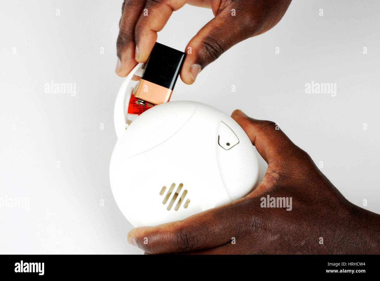Hands Holding Smoke Detector Stock Photo - Alamy