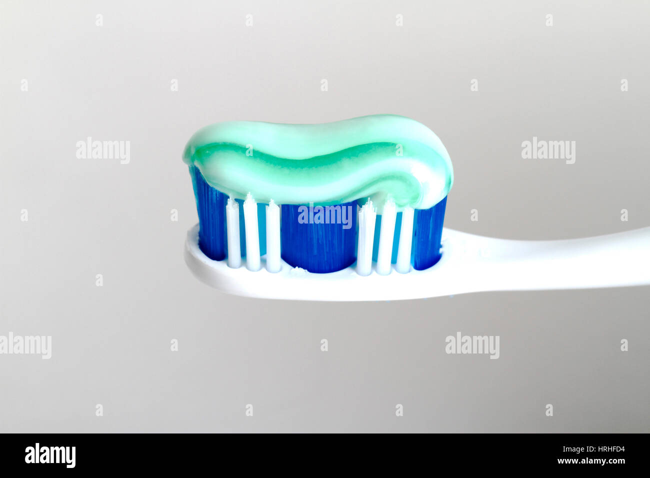 Toothpaste on Toothbrush Stock Photo - Alamy