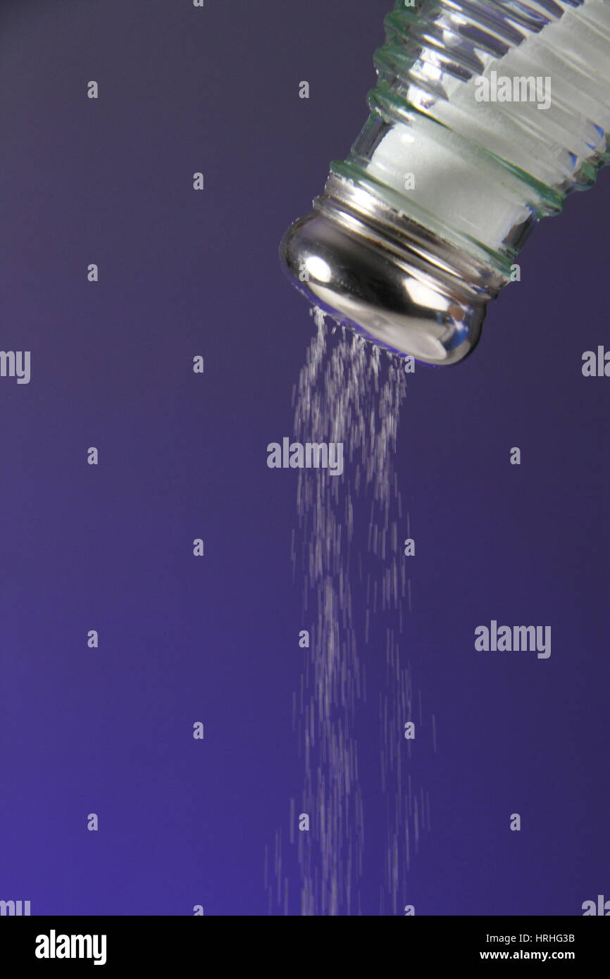 Salt Pouring out of Salt Shaker Stock Photo - Alamy
