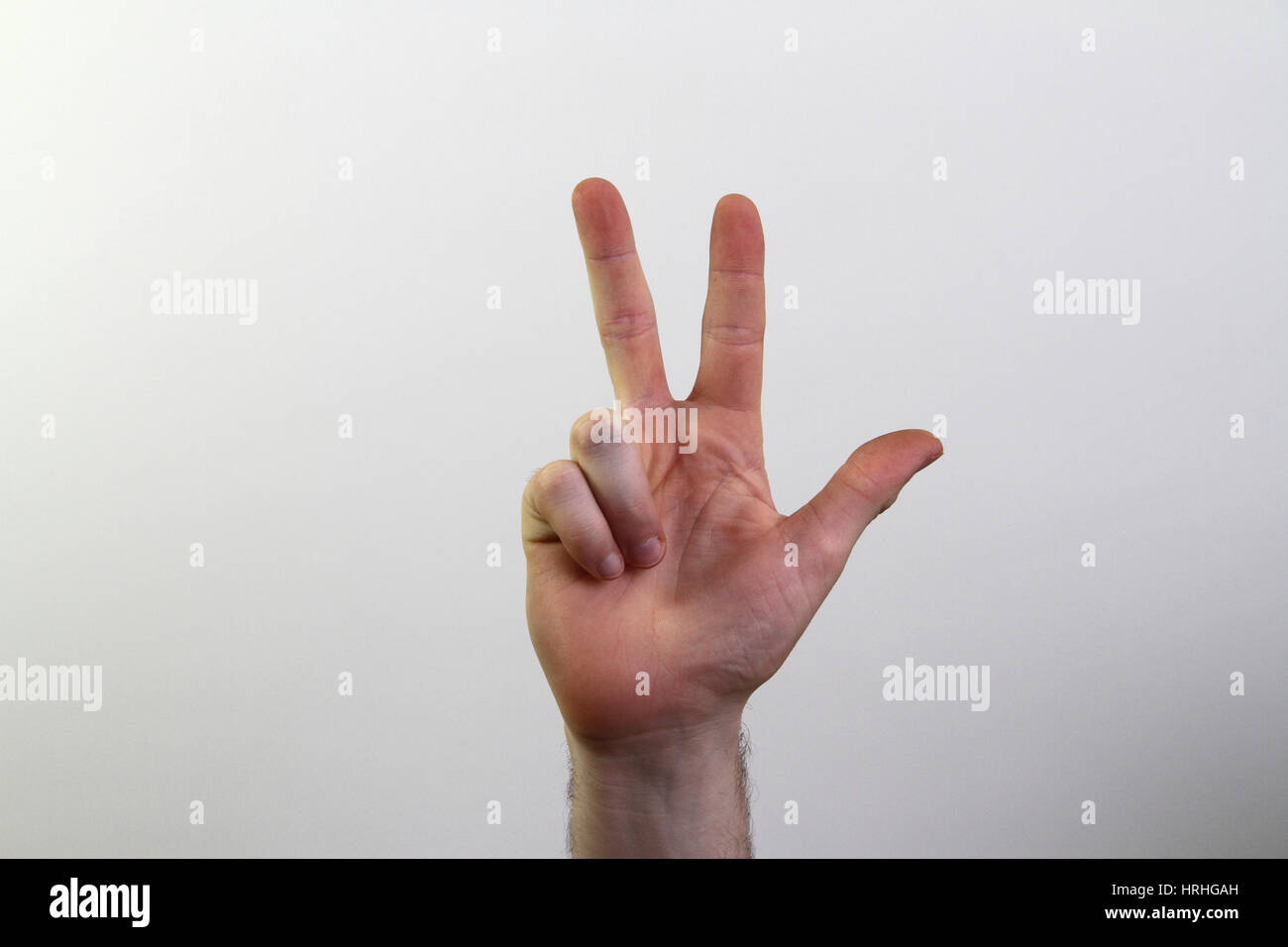 Three finger hand gesture sign hi-res stock photography and images - Alamy