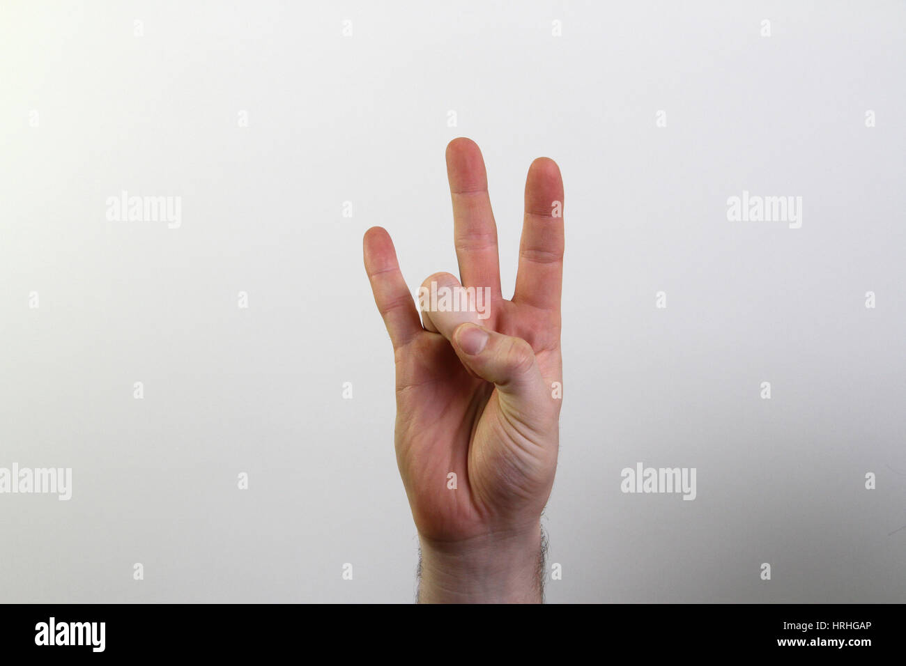 Hand signing number seven hi-res stock photography and images - Alamy
