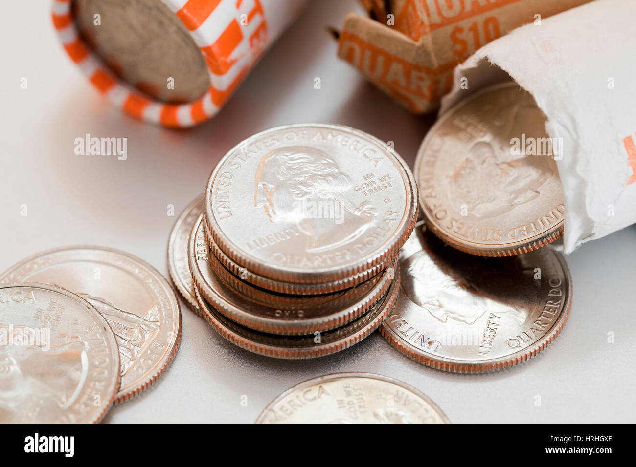 Roll of quarters hi-res stock photography and images - Alamy