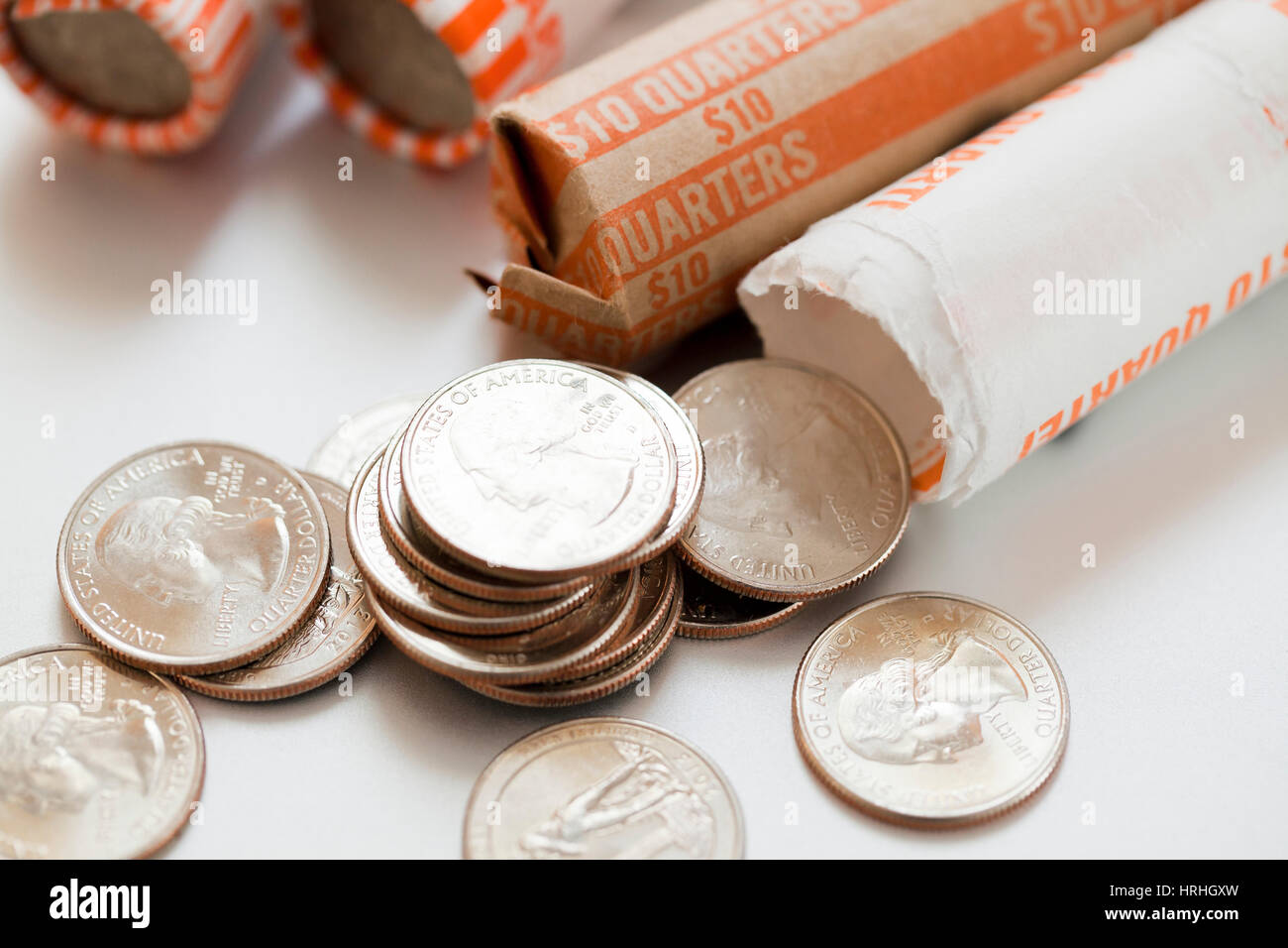 Roll of quarters hi-res stock photography and images - Alamy