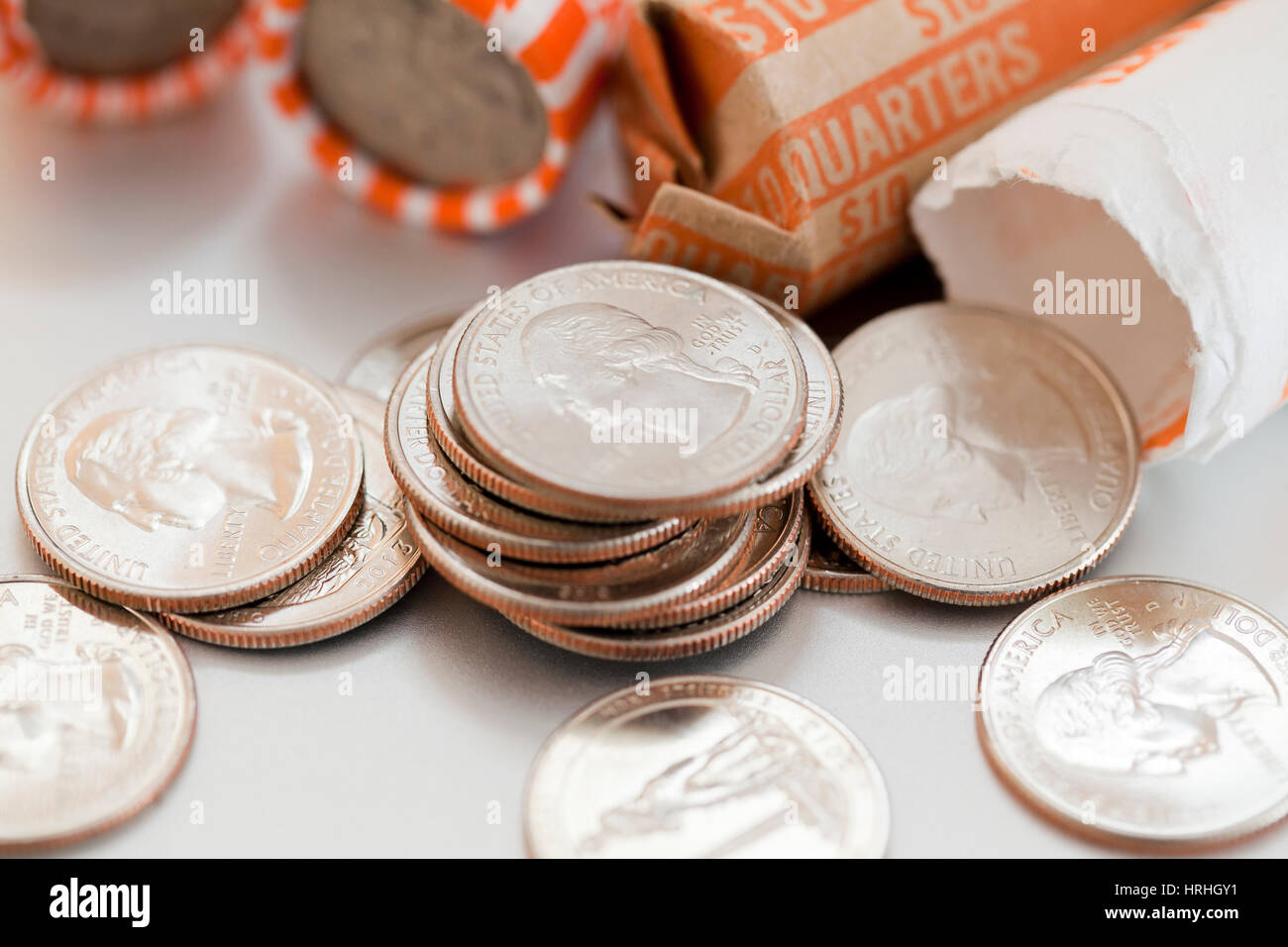 Roll of quarters hi-res stock photography and images - Alamy