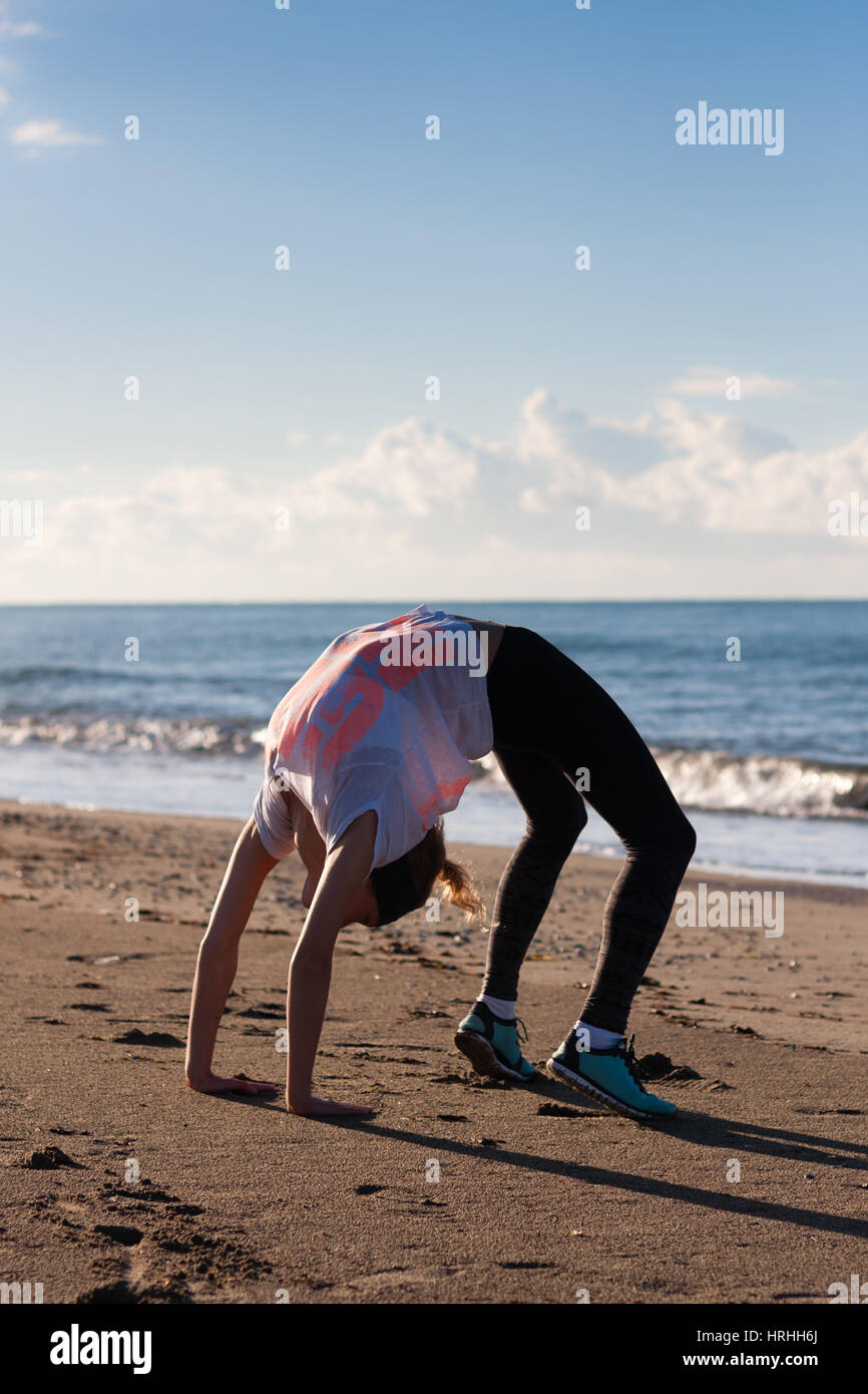 Woman crab position hi-res stock photography and images - Alamy
