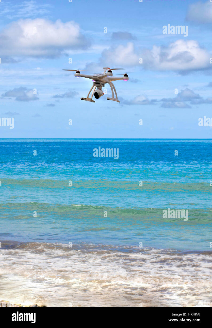 Drone flying over beach water hi-res stock photography and images - Alamy