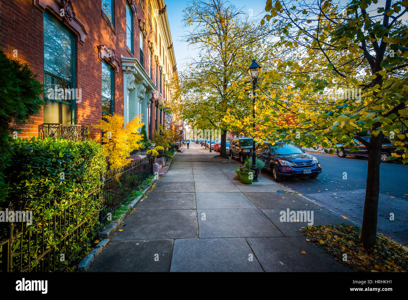 Autumn color and houses along Stricker Street, at Union Square, in ...