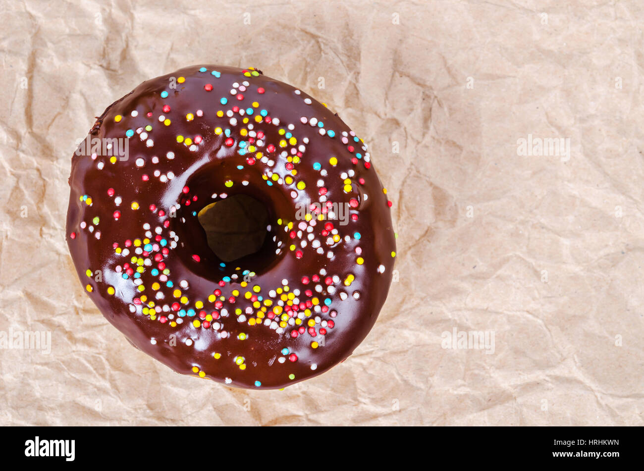 Chocolate Donuts on paper background Stock Photo - Alamy