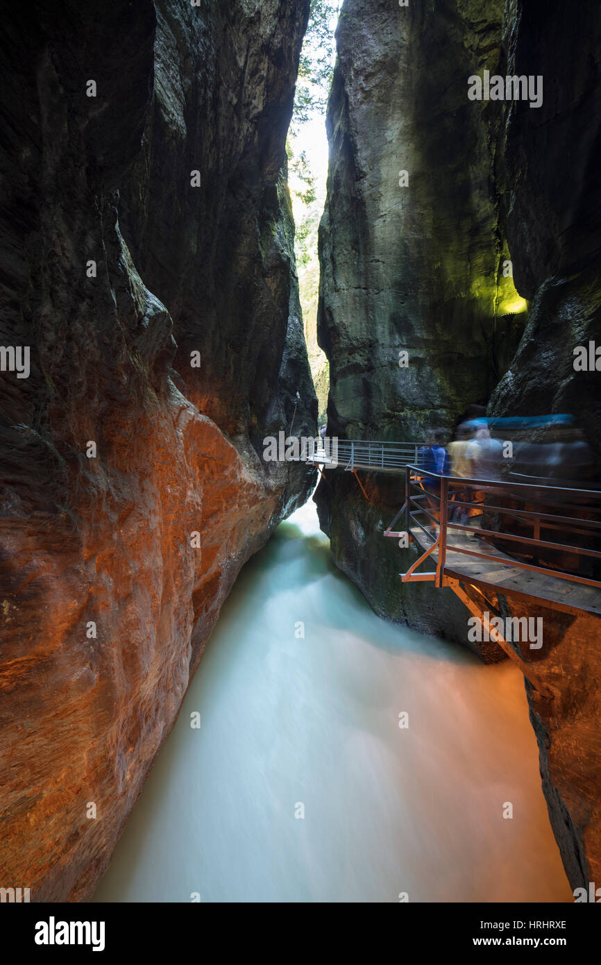 Water of creek flows in the narrow limestone gorge carved by river ...