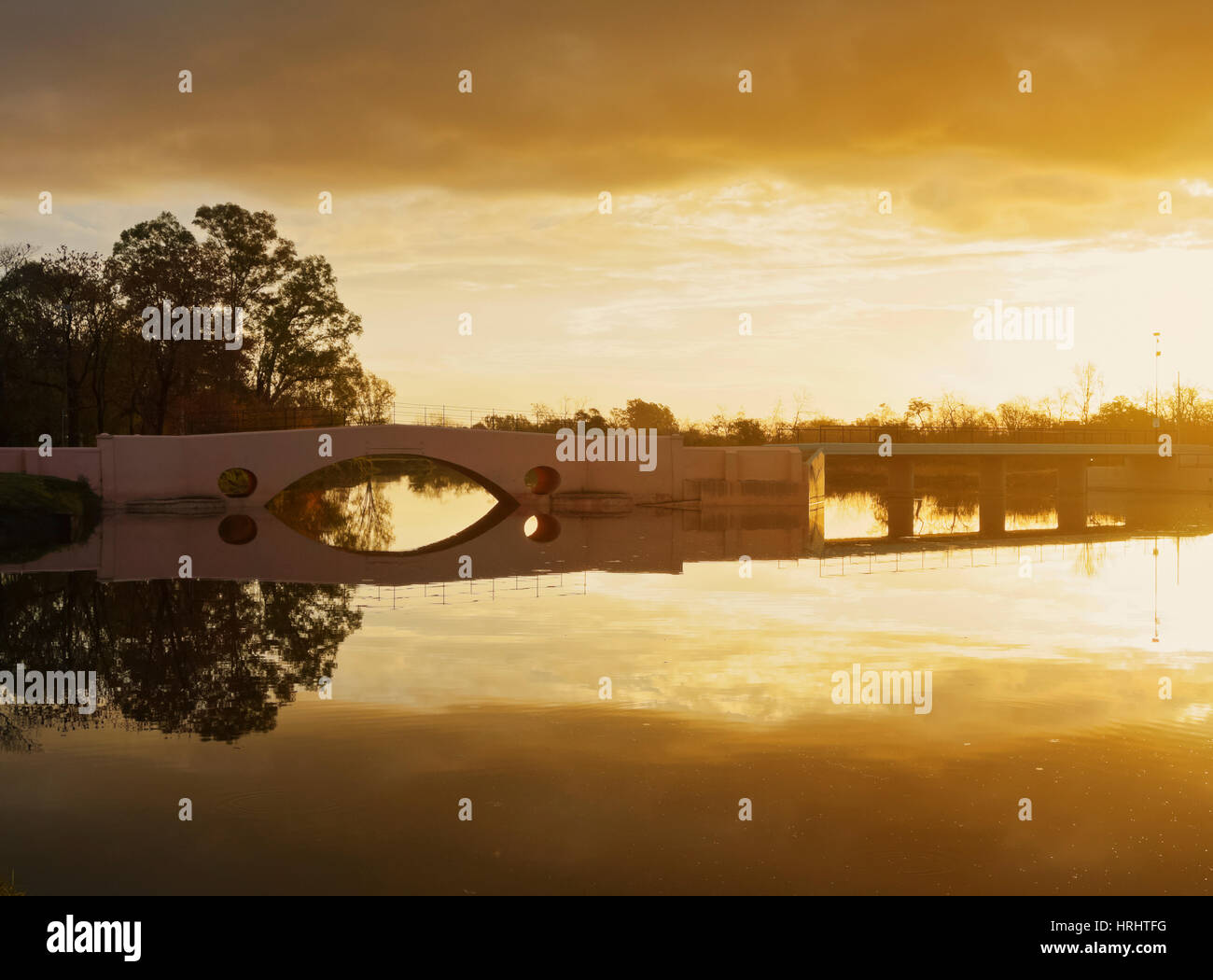 View of the Areco River and the Old Bridge at sunset, San Antonio de ...