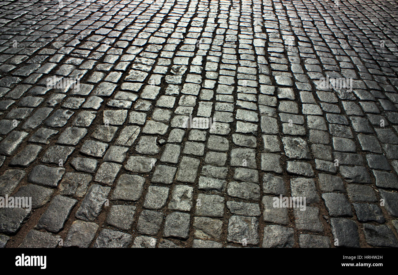 Beautiful paving stone illuminated by the sun Stock Photo - Alamy