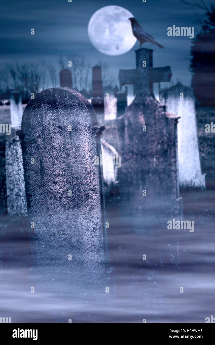 Spooky cemetery at night Stock Photo - Alamy