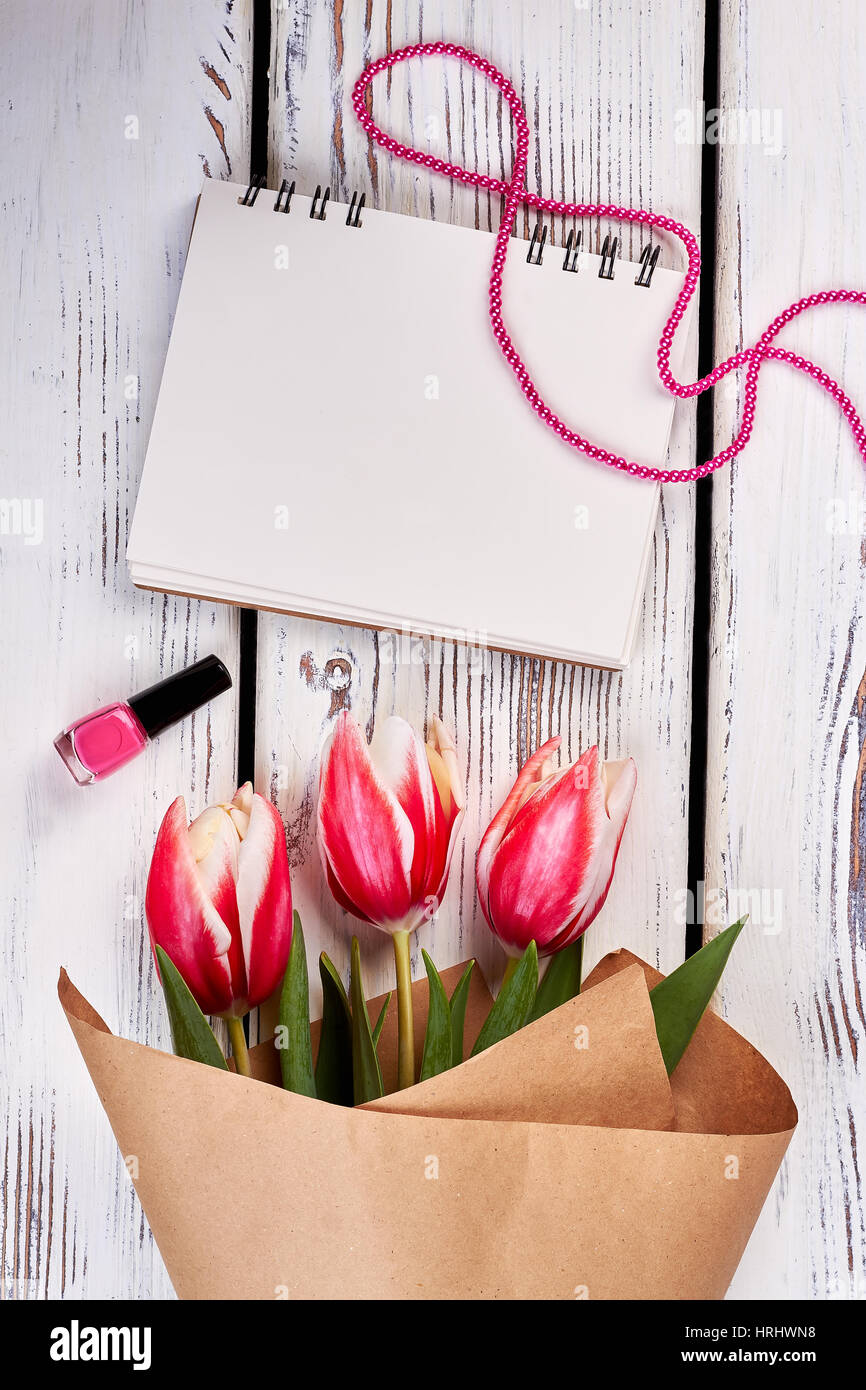 Bouquet of tulips on wooden backdrop. How to write love letter Stock ...