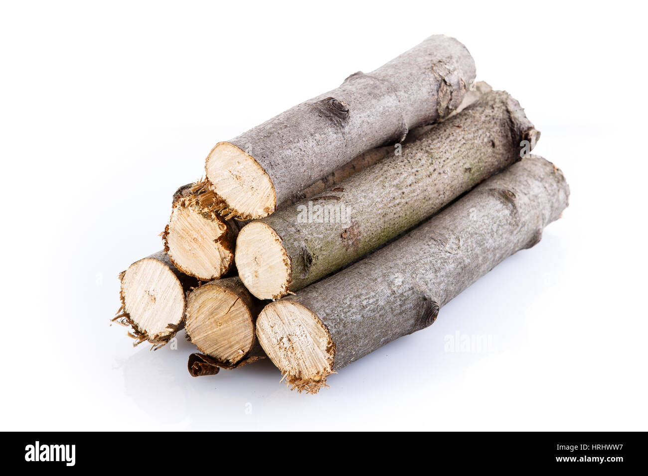 Stack of firewood isolated on white background Stock Photo - Alamy