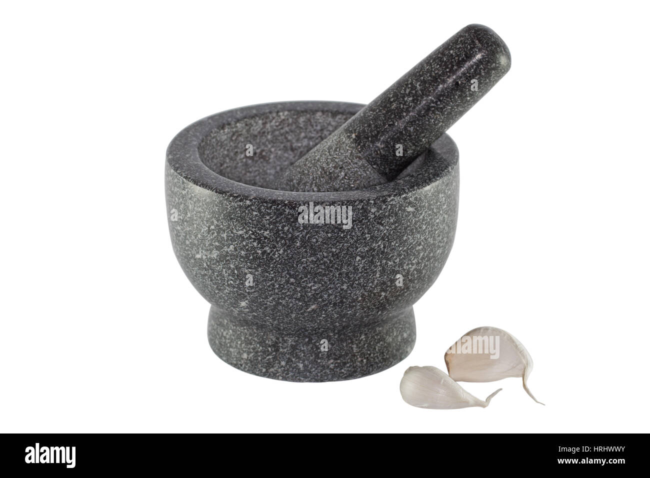 Mortar and Pestle with Two Garlic Cloves Isolated on a White Background ...