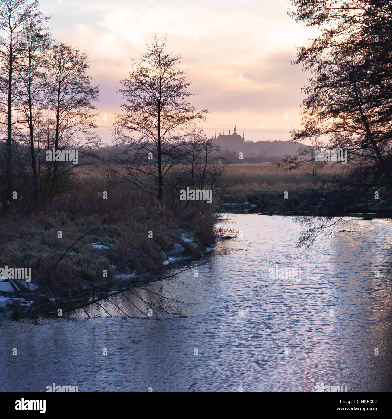pink purple yellow sunset on the river in the forest Stock Photo - Alamy