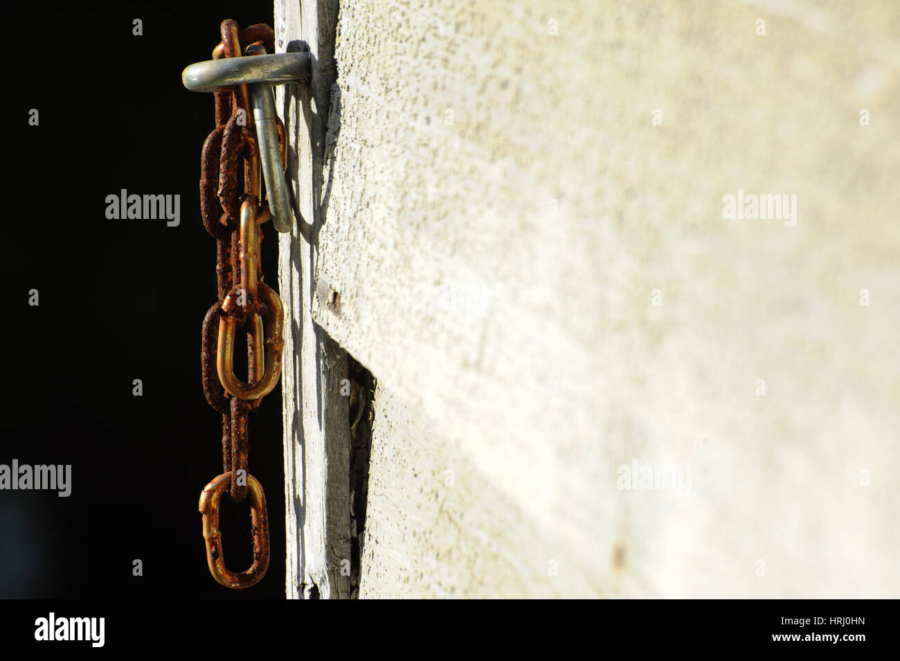 Rusty Chain on an Exterior Wall Stock Photo - Alamy