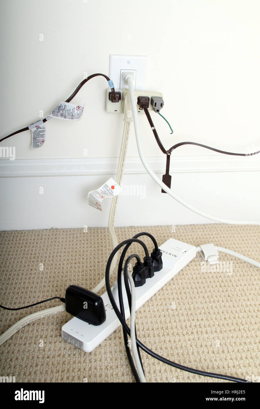 Overloaded Electrical Outlet Stock Photo - Alamy