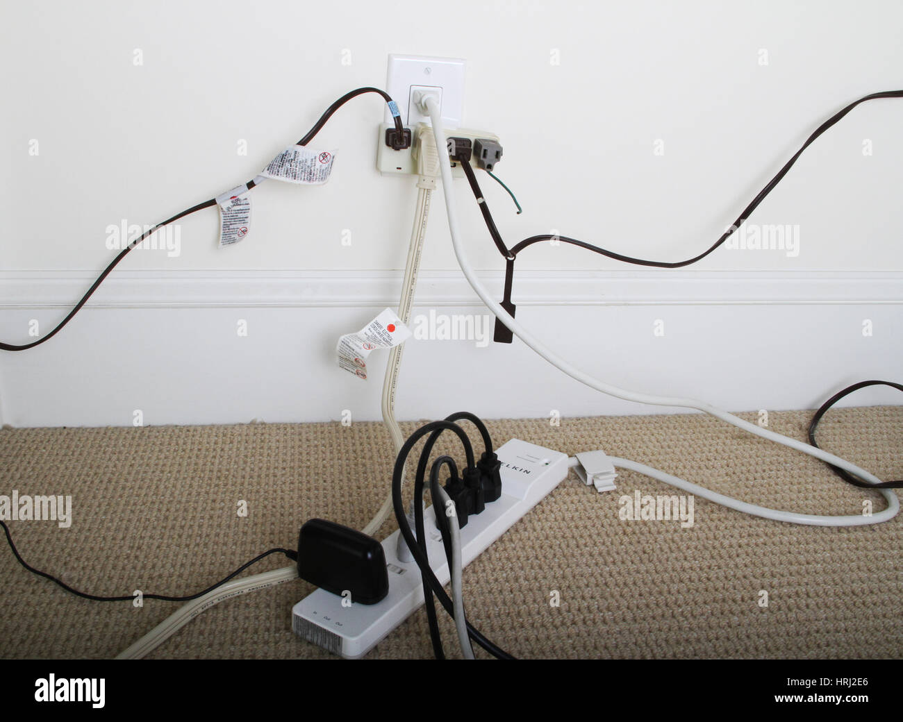 Overloaded Electrical Outlet Stock Photo - Alamy