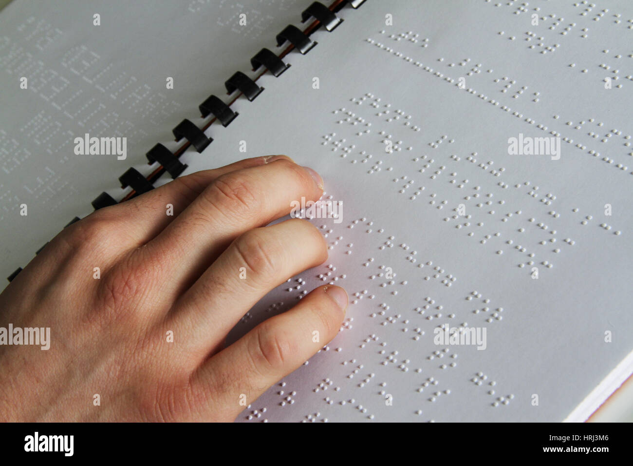 Reading braille letters hi-res stock photography and images - Alamy