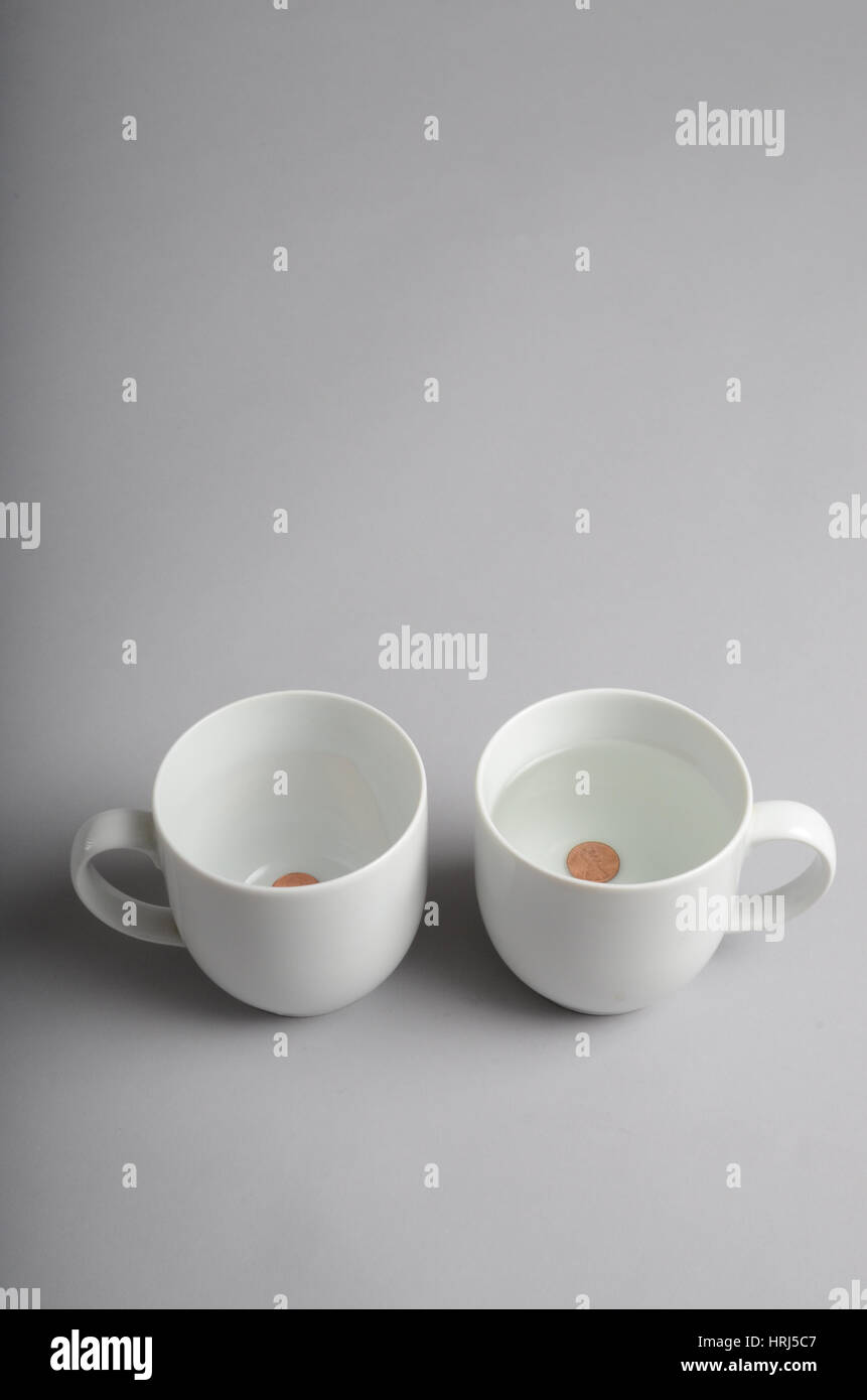 Science demonstration with coin hi-res stock photography and images - Alamy