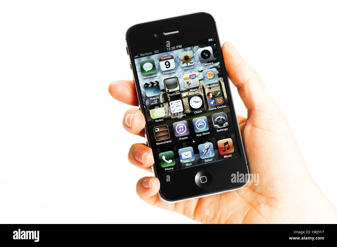 Hand holding an iphone Stock Photo - Alamy