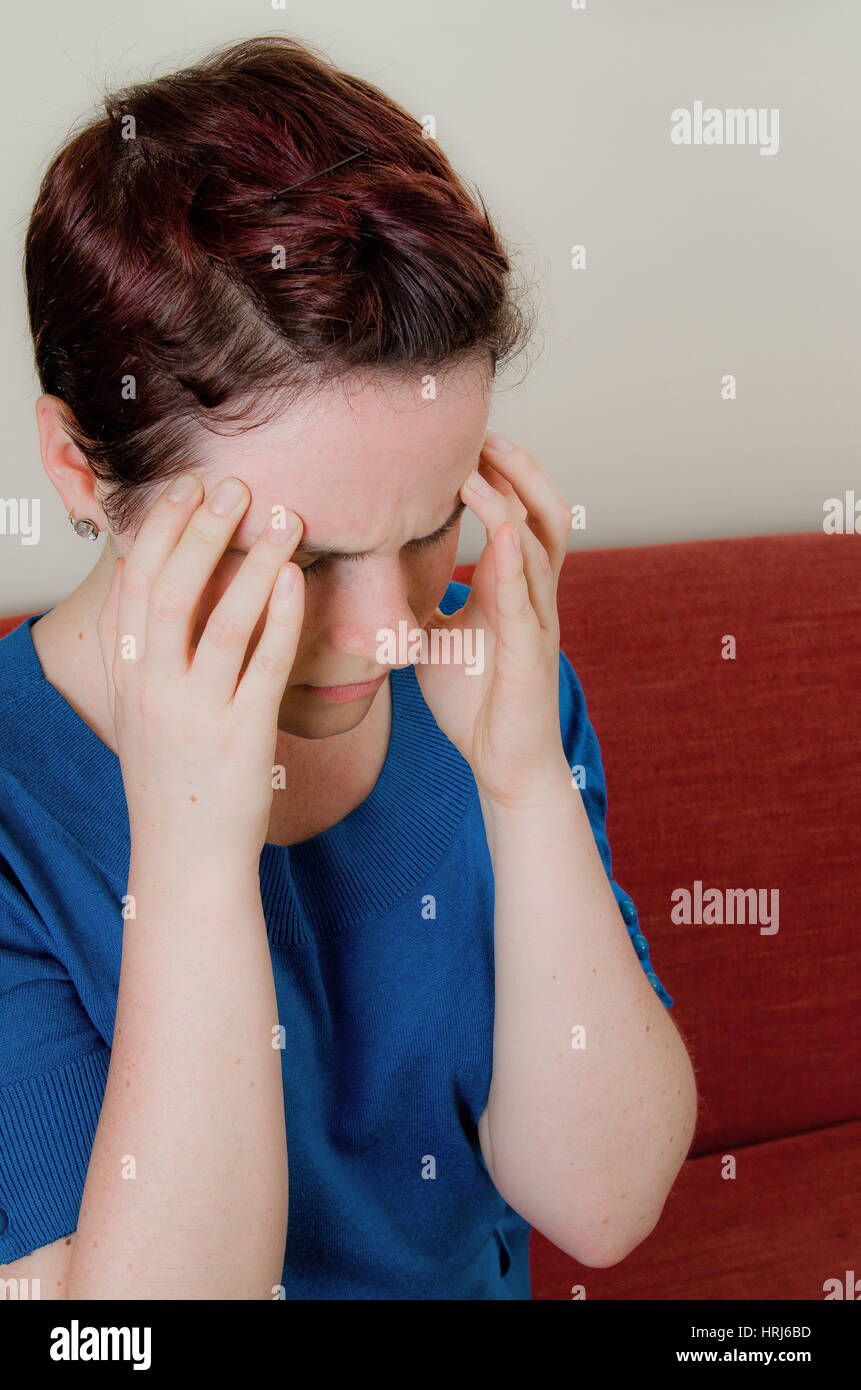 Clutching head hi-res stock photography and images - Alamy
