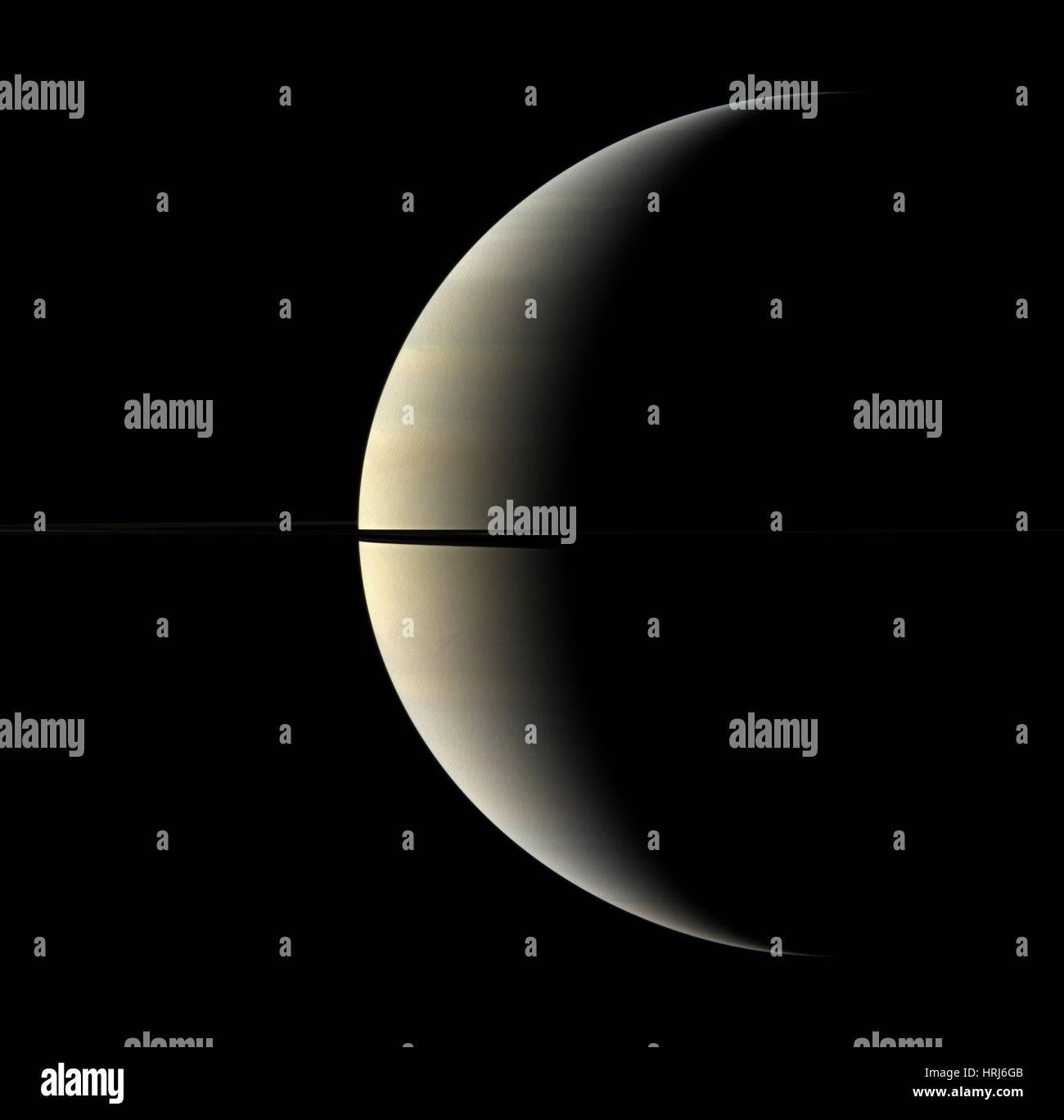 Saturn and its moon Mimas Stock Photo - Alamy
