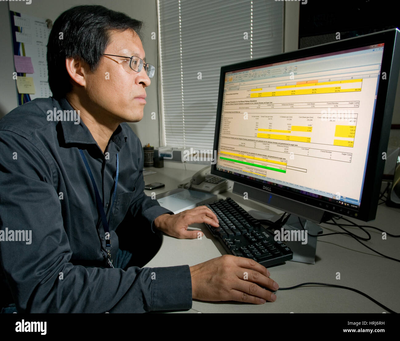 Scientist using GREET system Stock Photo - Alamy