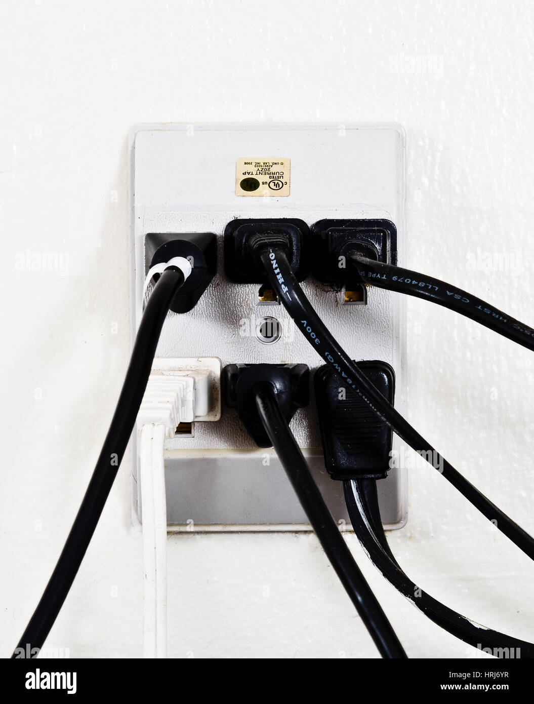 Electrical wall outlet overloaded plugs hi-res stock photography and ...