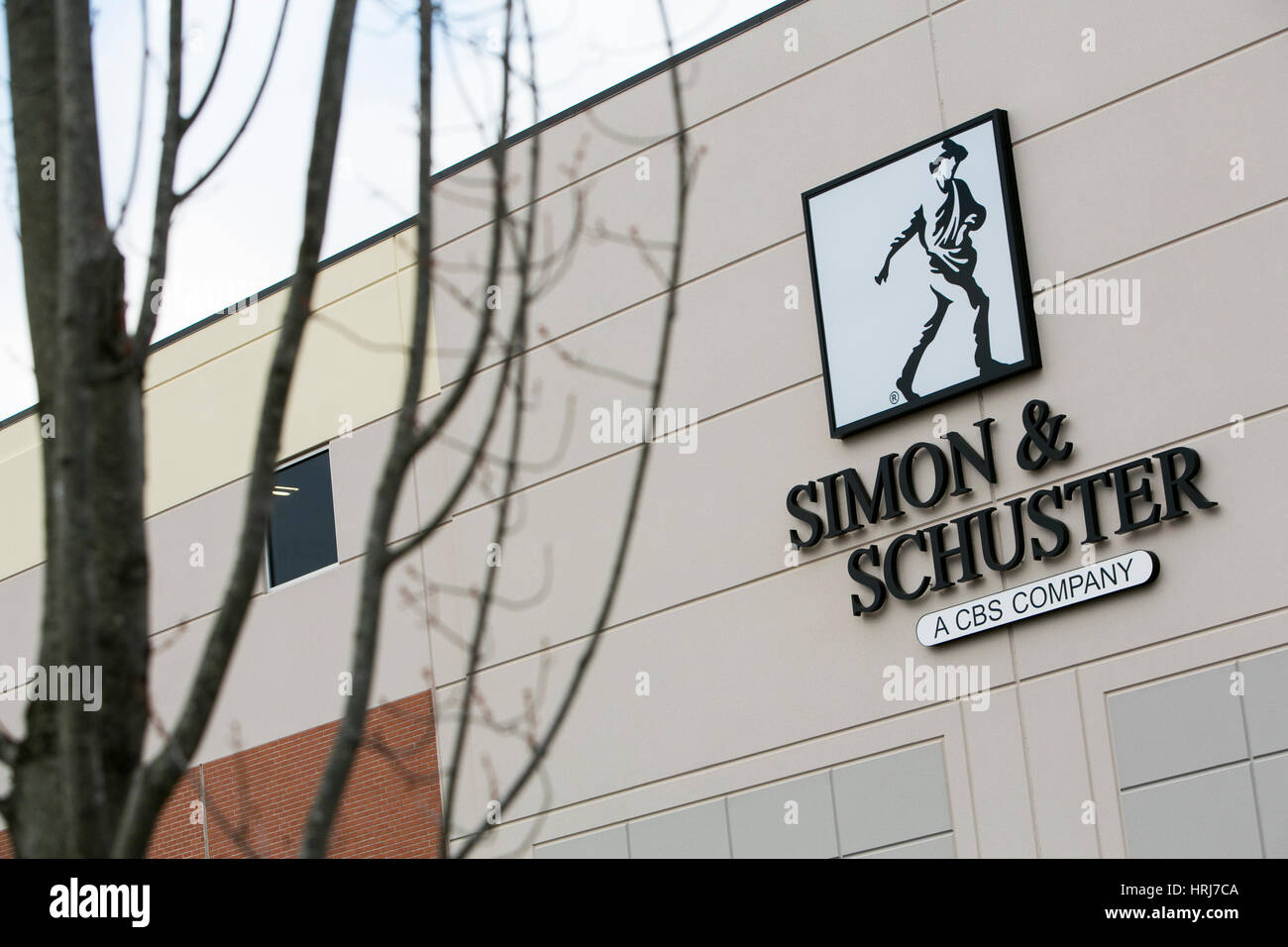 A logo sign outside of a Simon & Schuster, Inc., distribution warehouse ...
