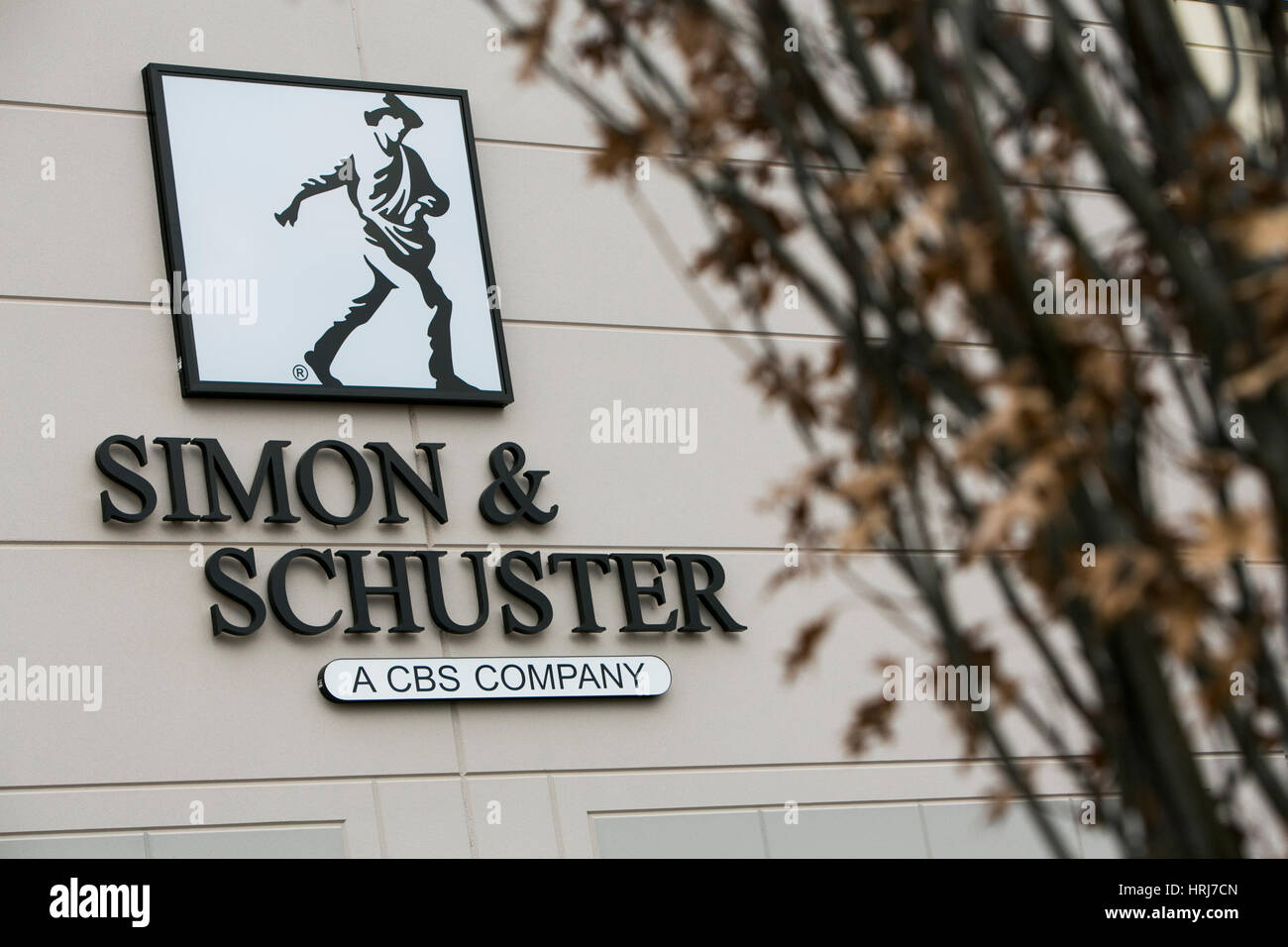 A logo sign outside of a Simon & Schuster, Inc., distribution warehouse ...