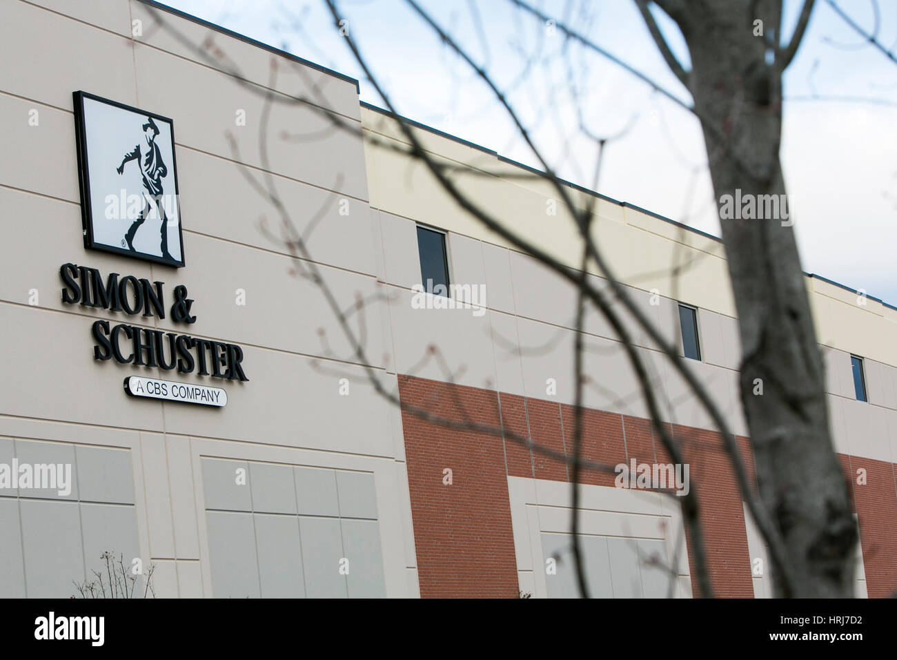 A logo sign outside of a Simon & Schuster, Inc., distribution warehouse ...