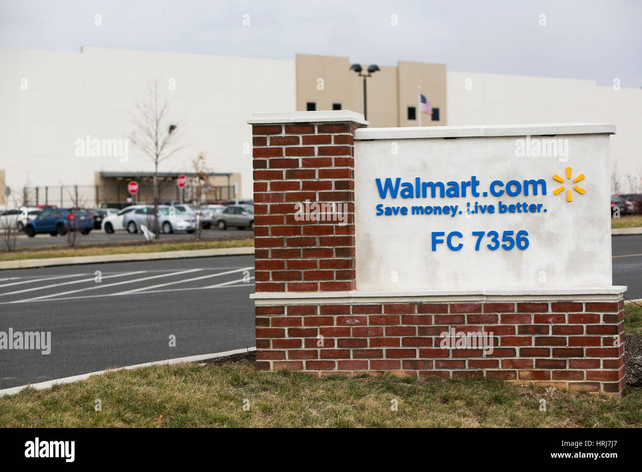 A logo sign outside of a facility occupied by Walmart.com in Bethlehem ...