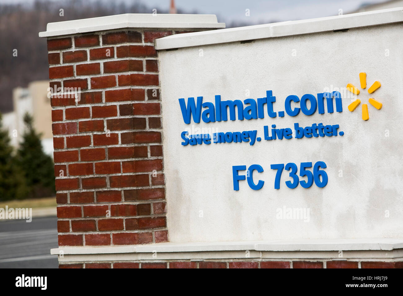 A logo sign outside of a facility occupied by Walmart.com in Bethlehem ...