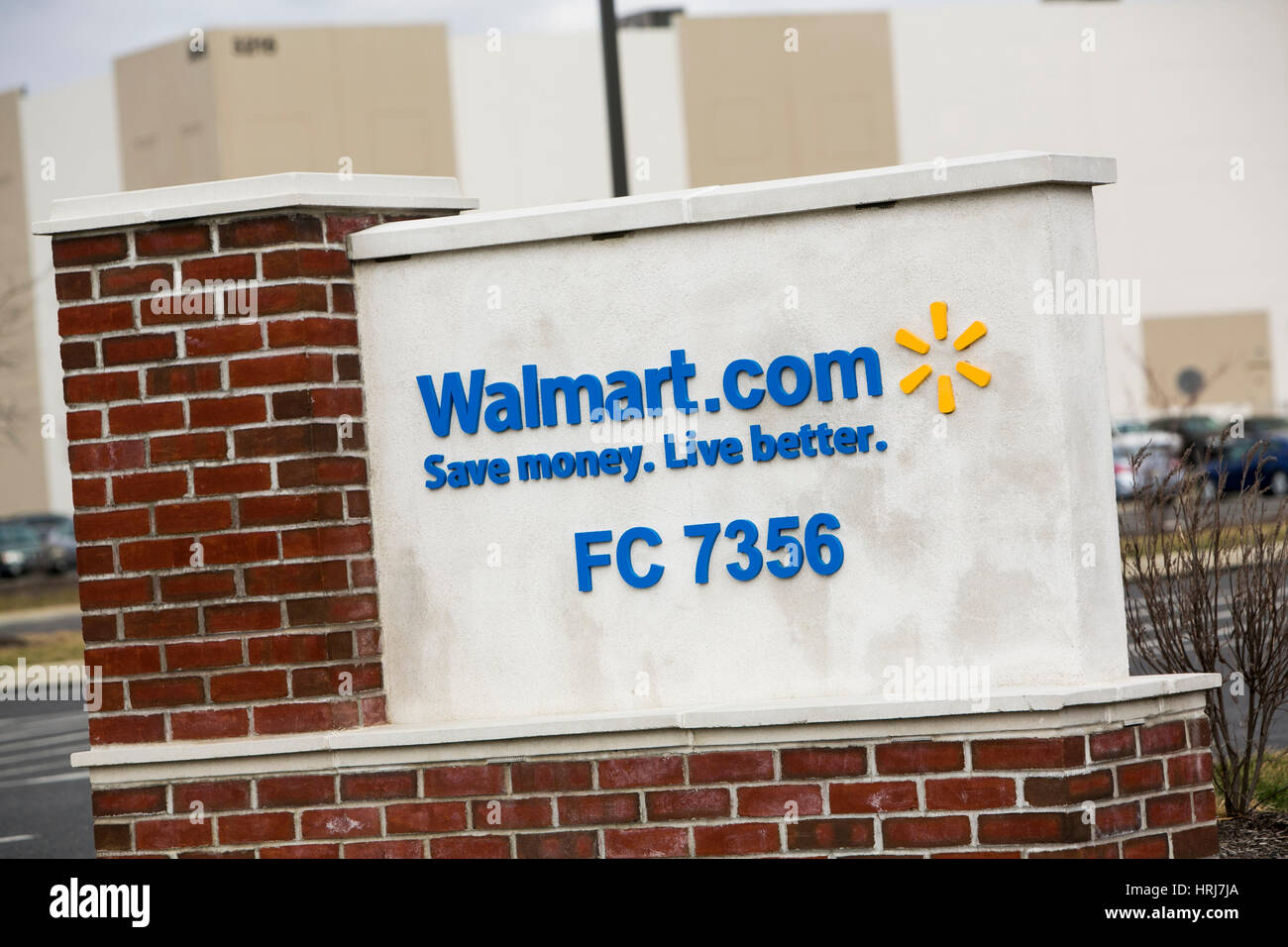 A logo sign outside of a facility occupied by Walmart.com in Bethlehem ...