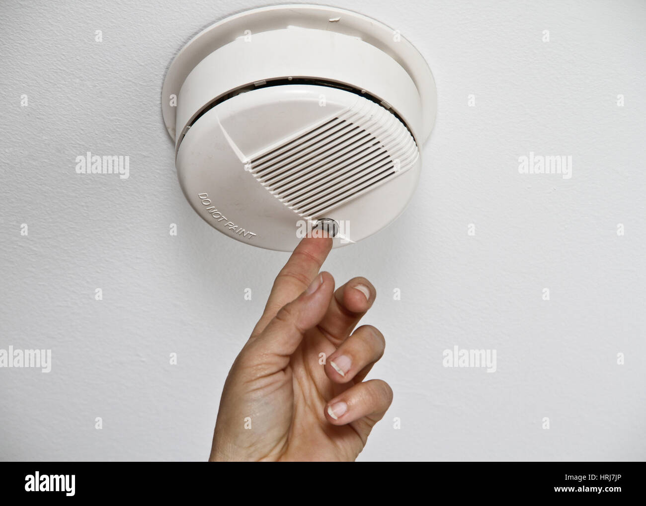 Testing a Smoke Alarm Stock Photo - Alamy