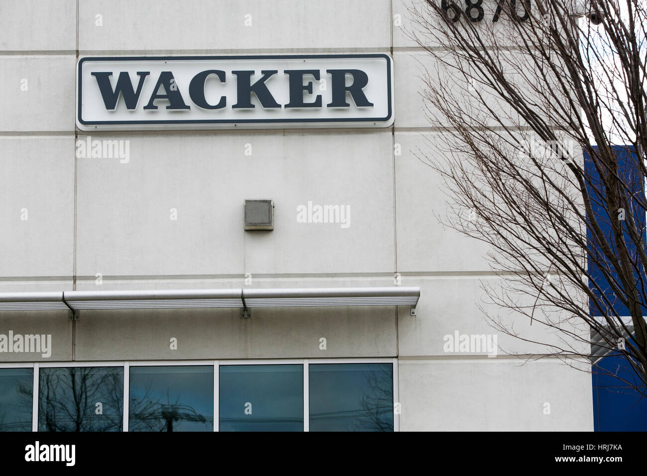 A logo sign outside of a facility occupied by Wacker Chemie in ...