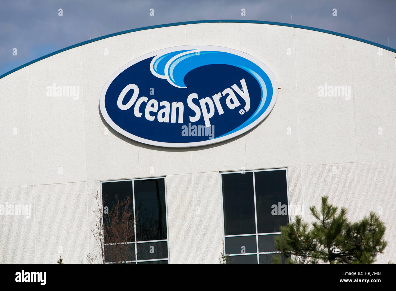A logo sign outside of a facility occupied by Ocean Spray in ...