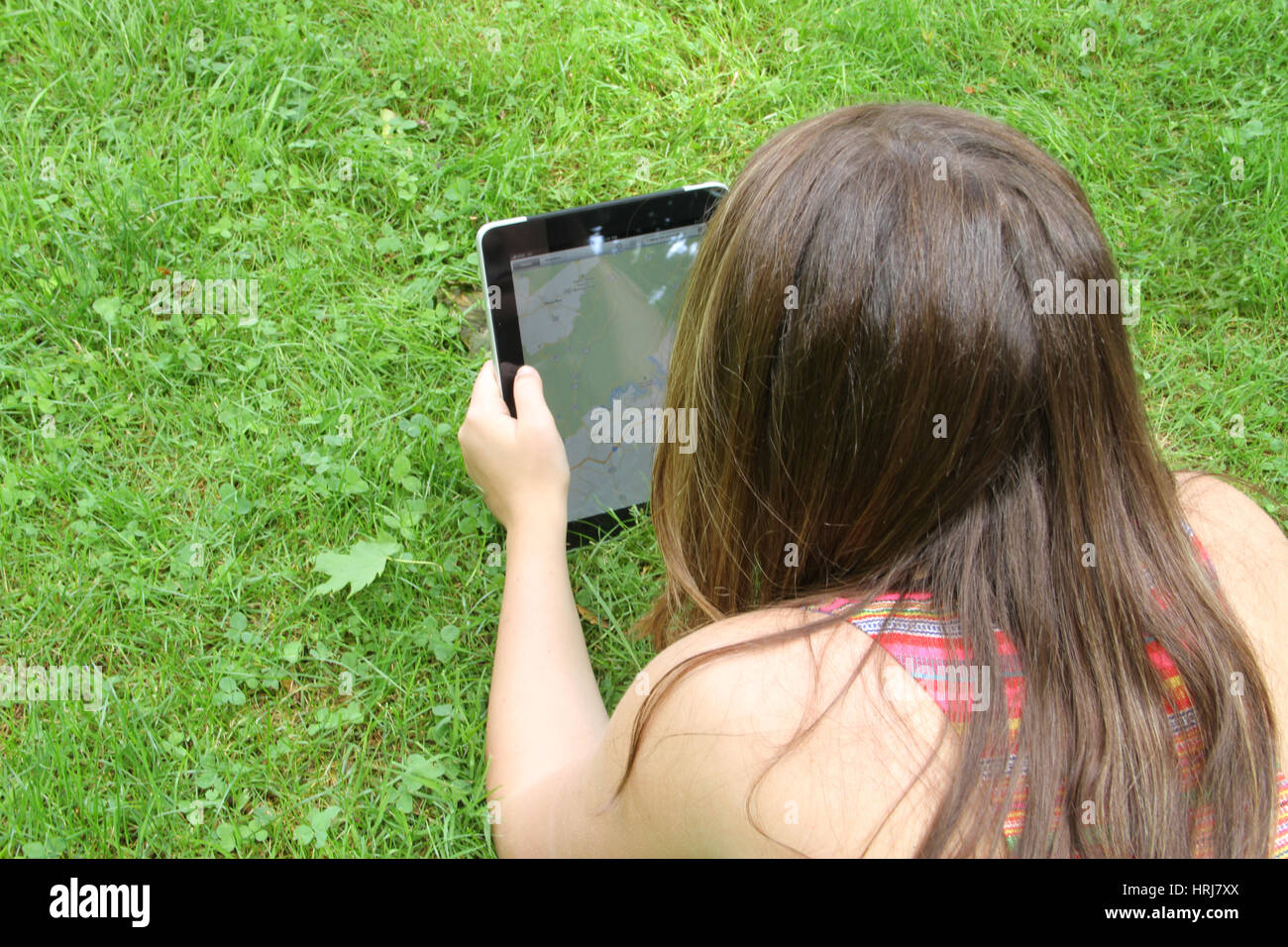 Young person using an apple product hi-res stock photography and images ...