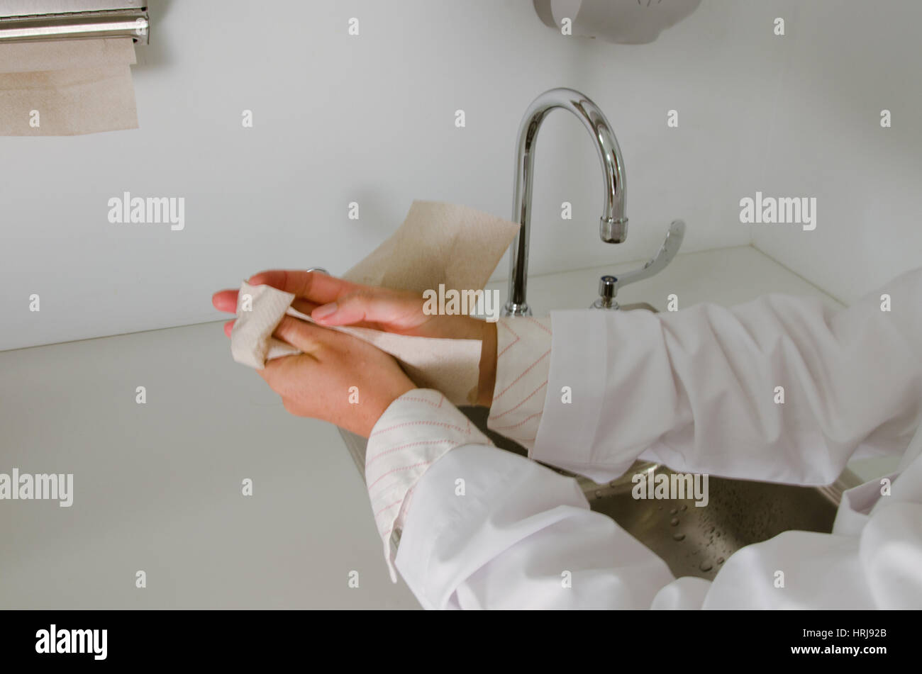 Drying hands with paper towels hi-res stock photography and images - Alamy