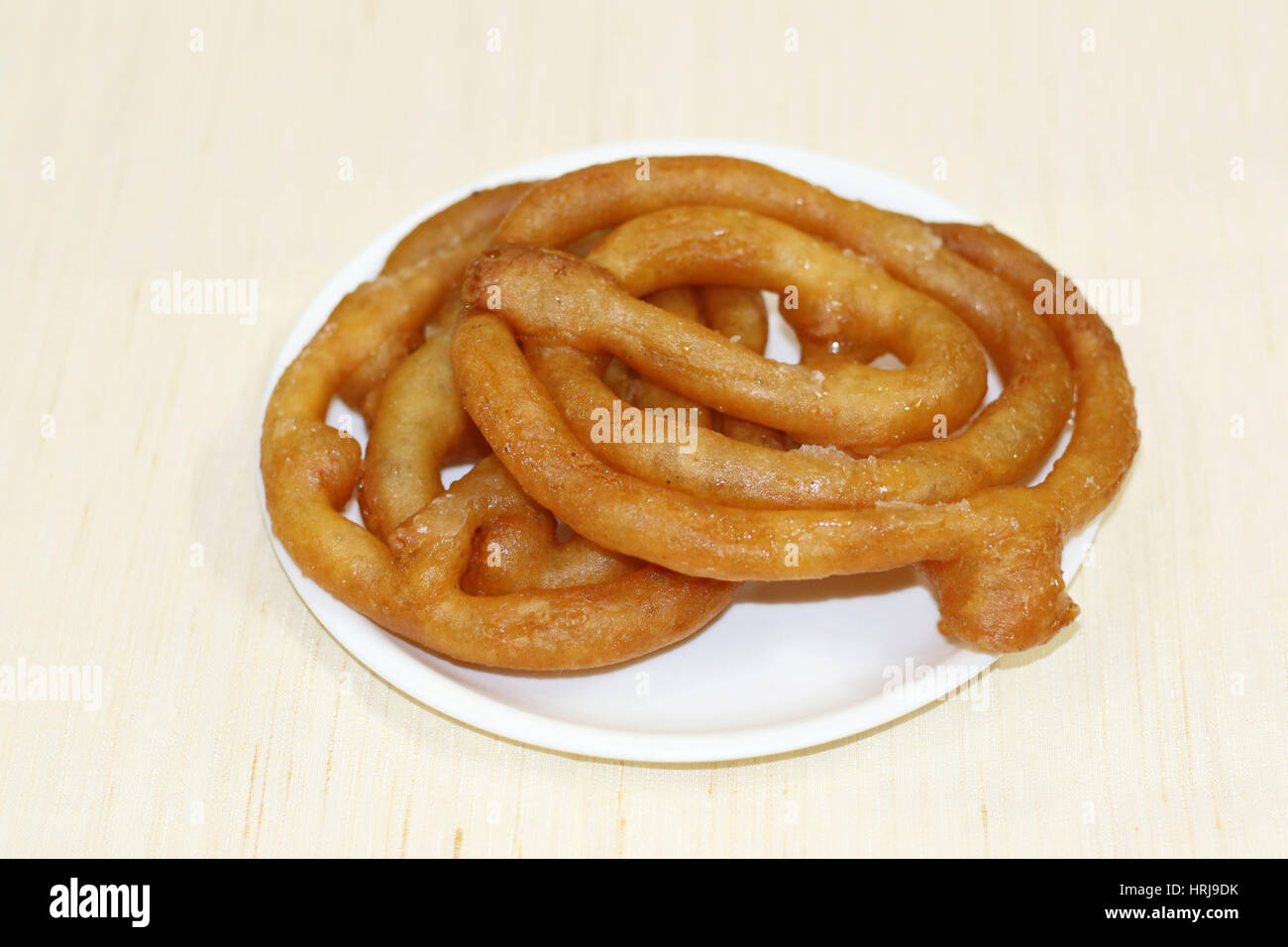 Jalebi, popular Indian sweet dessert made of deep fried dough Stock ...