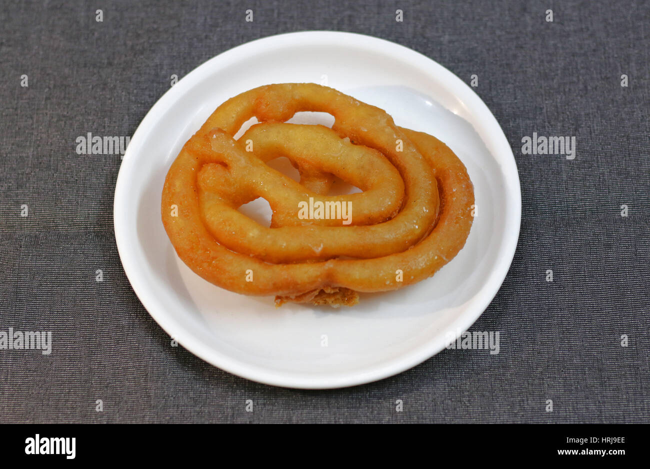 Jalebi, popular Indian sweet dessert made of deep fried dough Stock ...