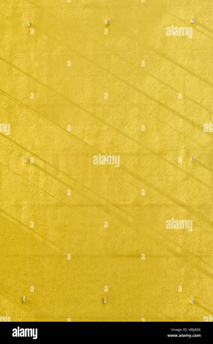 Yellow wall background with narrow shadow strips Stock Photo - Alamy