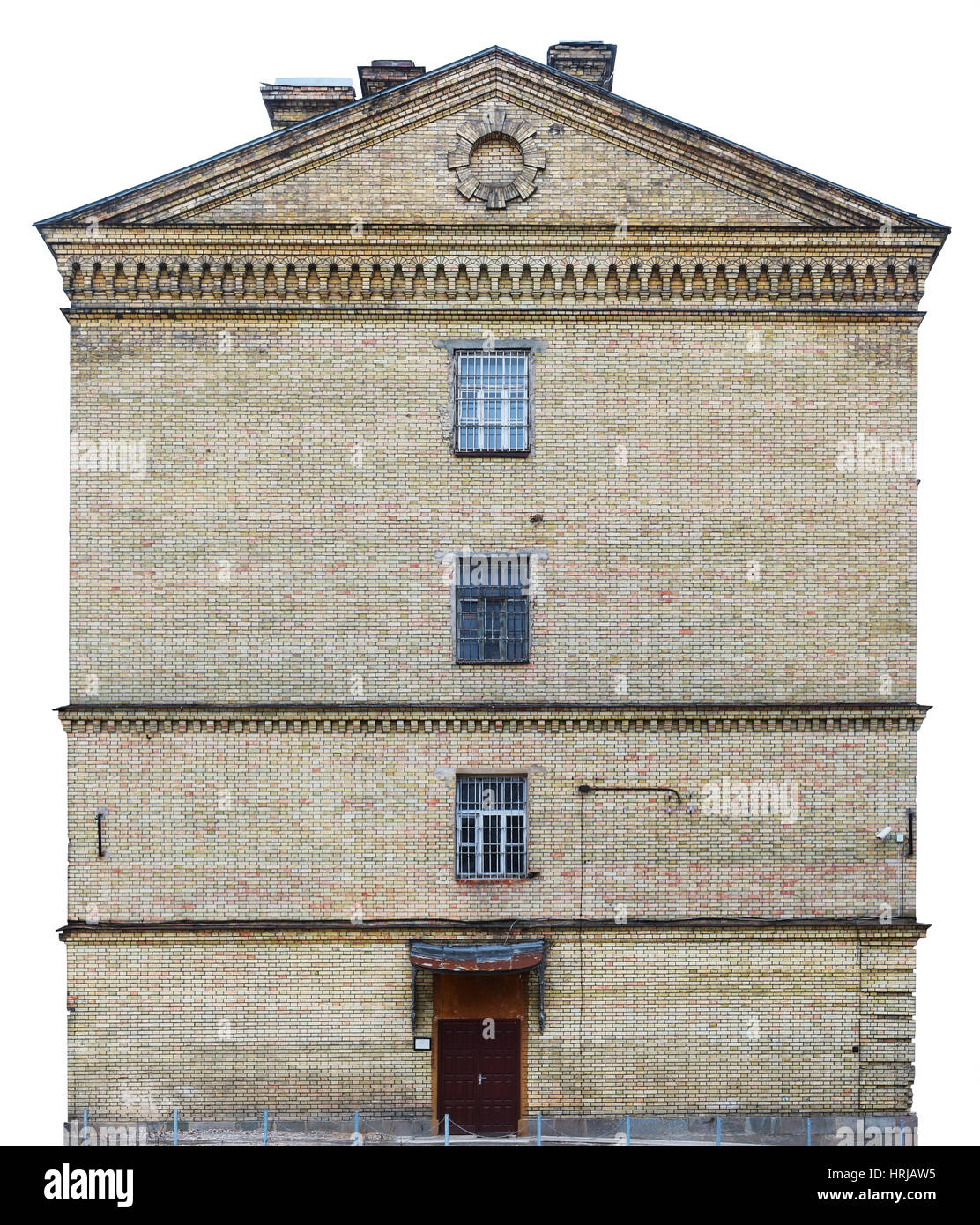 Side wall of the old aged yellow brick house, which was built in the ...