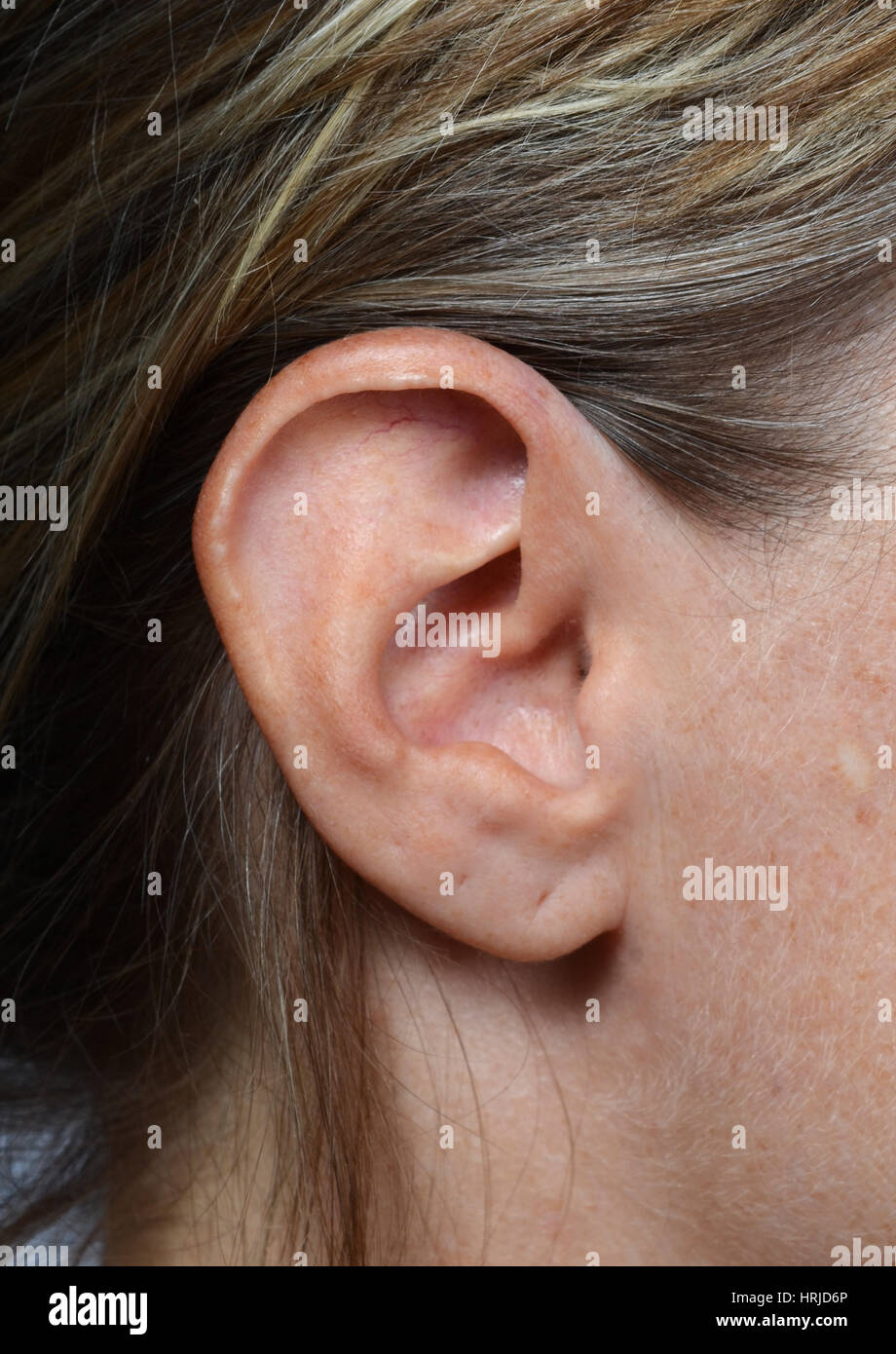 Earring hole hi-res stock photography and images - Alamy