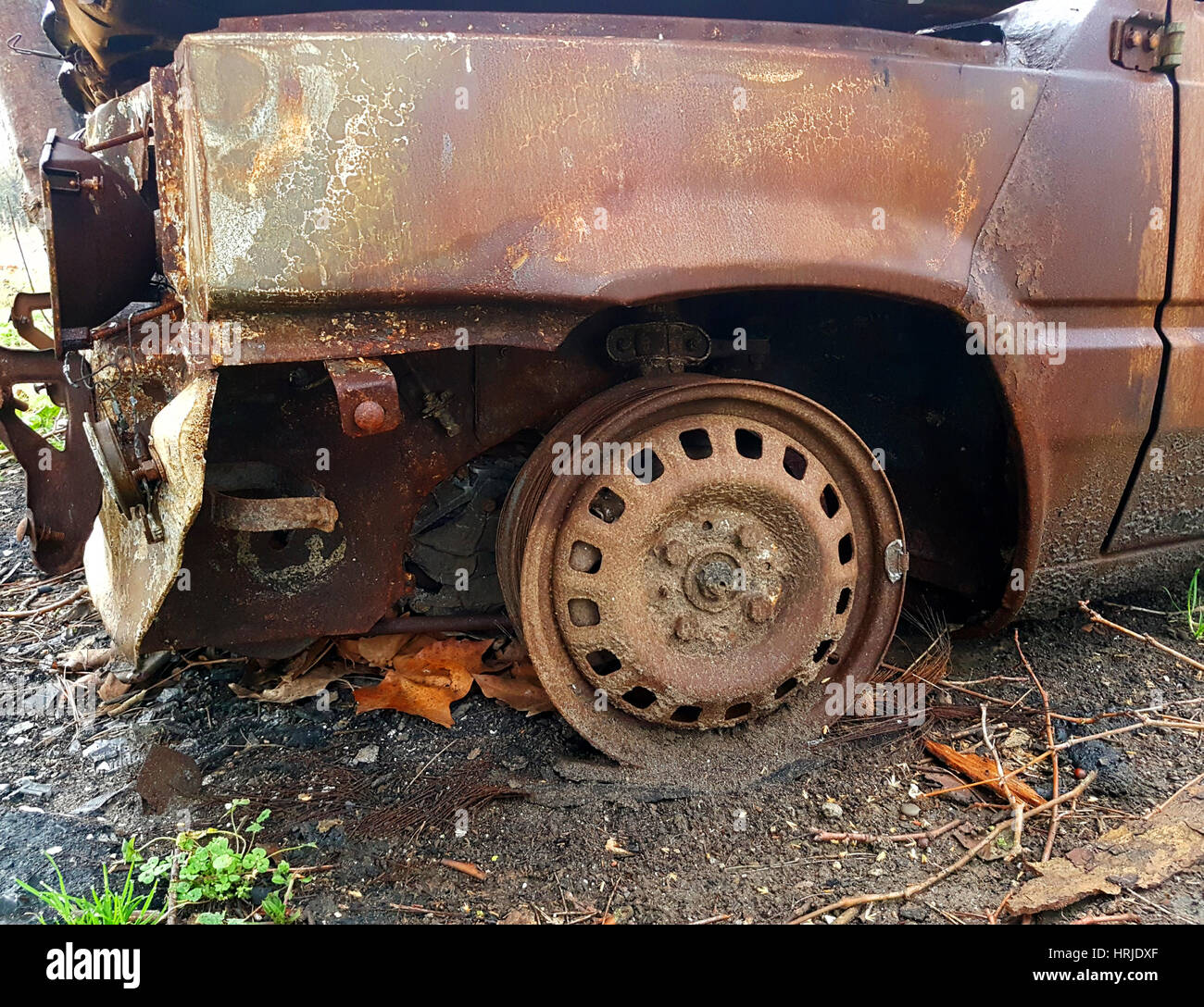 Deadly road accident with fire and rusty car abandoned along the way ...