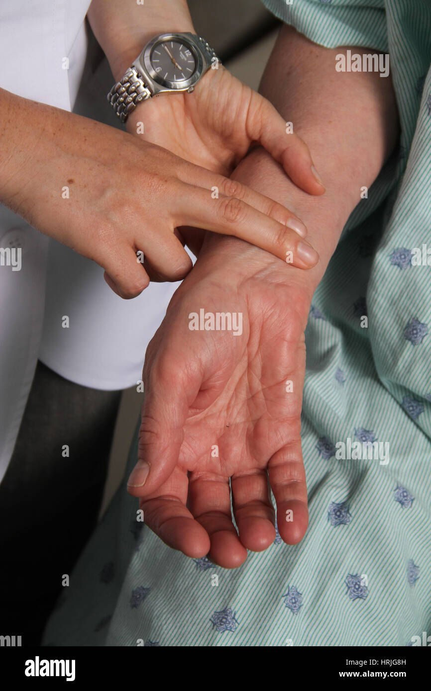 Doctor Taking Patient's Pulse Stock Photo - Alamy