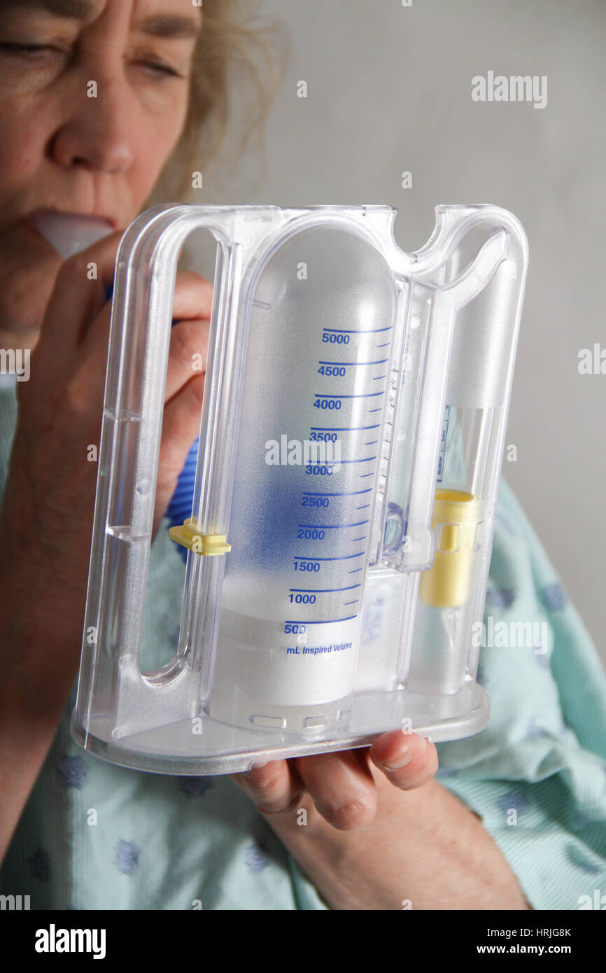 Woman doing a Spirometry Test Stock Photo - Alamy